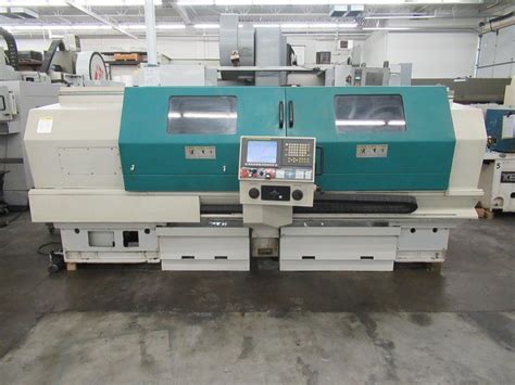Clausing Cke6150z Cnc Flat Bed Lathe With 6 Station Turret 3 Jaw Chuck Tailstock And Fanuc Oi