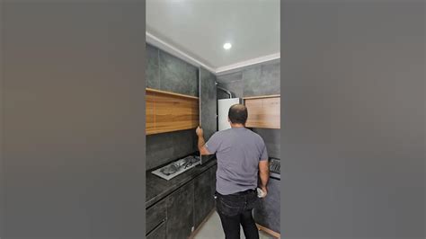 کابینت مدرن با متریالطوسی بتنی بست وود و لیون روشن بست وودcabinet