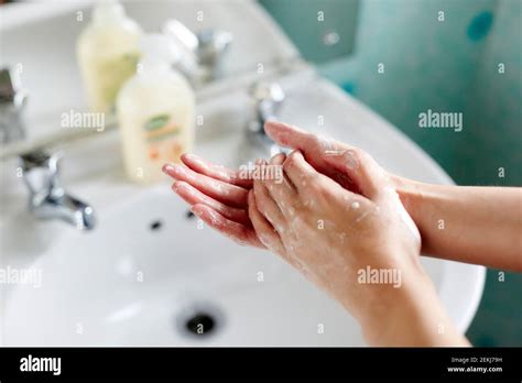 Woman Washing Her Hands Stock Photo Alamy