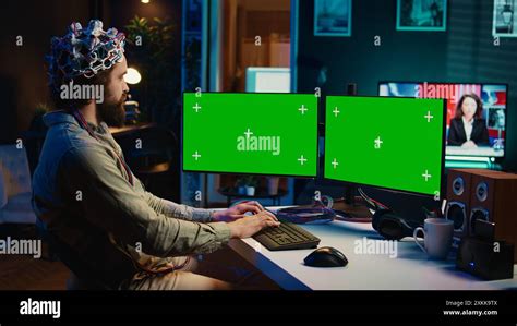 Engineer With Eeg Headset On Programming Brain Transfer Into Computer