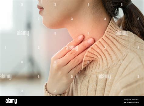 Asian Woman Put On Neck Due To A Sore Throat Female Tonsillitis Causes