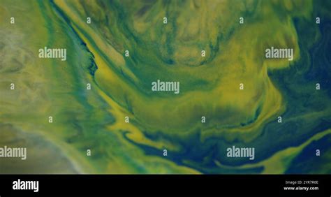 Oil Mix Spill Blend Yellow Blue Green Colorful Flows Shimmering Fluid Flow Floating On