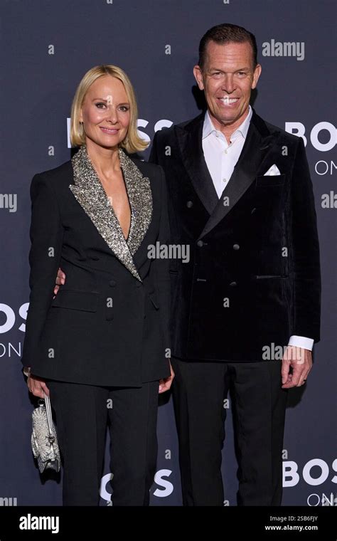 Louise Camuto Grieder Left And Daniel Grieder Pose For Photographers Upon Arrival At The Boss