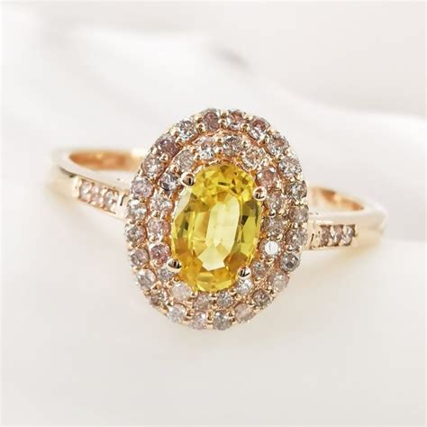 066 Ct Yellow Sapphire And 032 Ct Vs Light Pink Diamonds Catawiki
