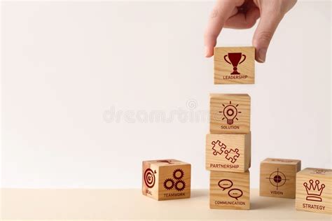Closeup View Of Woman Stacking Wooden Cubes With Different Images At Table Space For Text