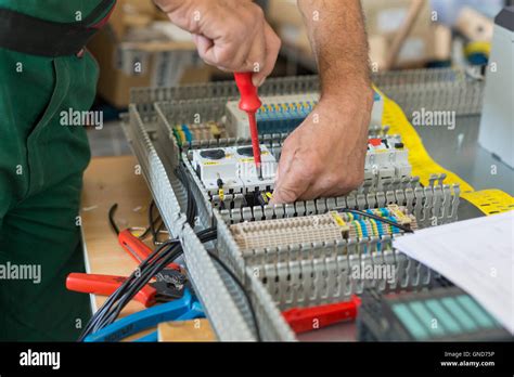 Electrician Assembling Industrial Electric Cabinet Stock Photo Alamy