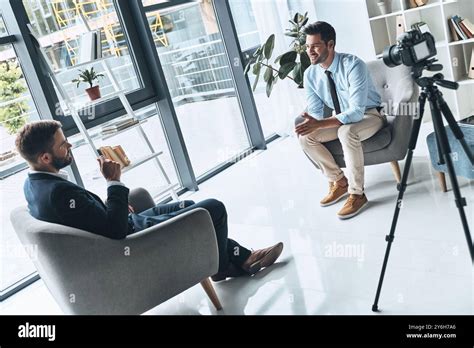 Business Interview Two Young Men In Smart Casual Wear Talking While