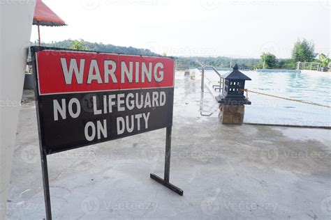 Selective Focus On The Warning Sign In The Pool Area That There Are No
