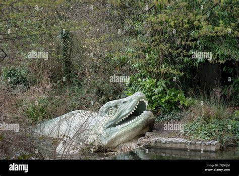 A Park Landscape Of Victorian Era Grade I Listed Dinosaur Sculptures In
