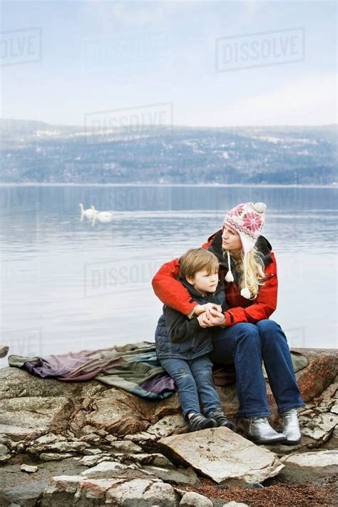 Mother And Son Relaxing At Lake Royalty Free Stock Photo Dissolve