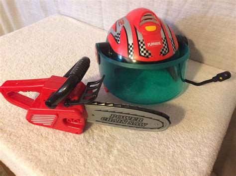 Playskool Racing Helmet With Toy Chainsaw Toy Lot 1856875205