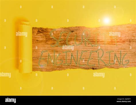 Conceptual Hand Writing Showing Security Engineering Concept Meaning Focus On The Security