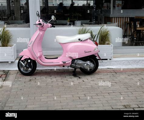 Pink Vespa Motor Scooter Parked By The Roadside Agistri Island