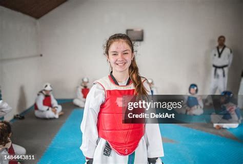 Portrait Of A Cheerful Girl Taekwondo Fighter In A Japanese Kimono And