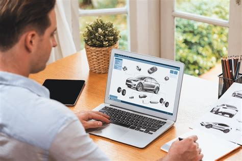 Premium Photo Car Designer Carefully Analyzing Car Prototype Synchronos