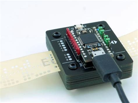 This Handheld Tape Reader Can Extract Data From Paper Tape