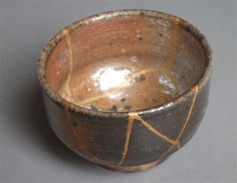 Kintsugi Repairing Pottery With Gold Spinning Pots