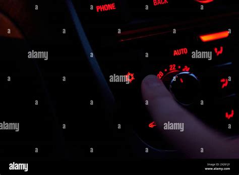 Man Hand Turns The Air Conditioner In A Car At Night Temperature And Blow Air Conditioner