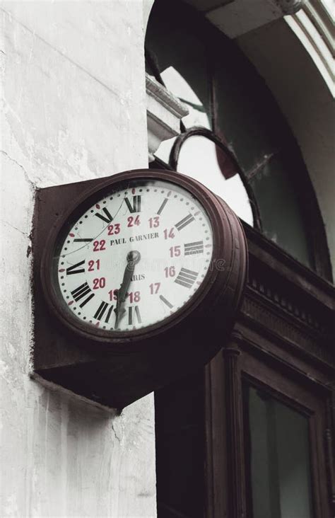 A Clock On The Wall Of An Old Railway Station The Clock Is Made By A