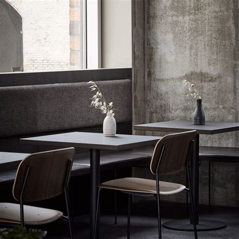 Wood Stone And Adobe Create Cosy Interior For Limas Mérito Restaurant