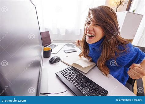 Female Software Developer Celebrating Success While Working From Home Stock Photo Image Of