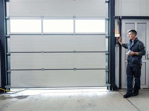 How To Repair A Damaged Garage Door Garage Door Repair