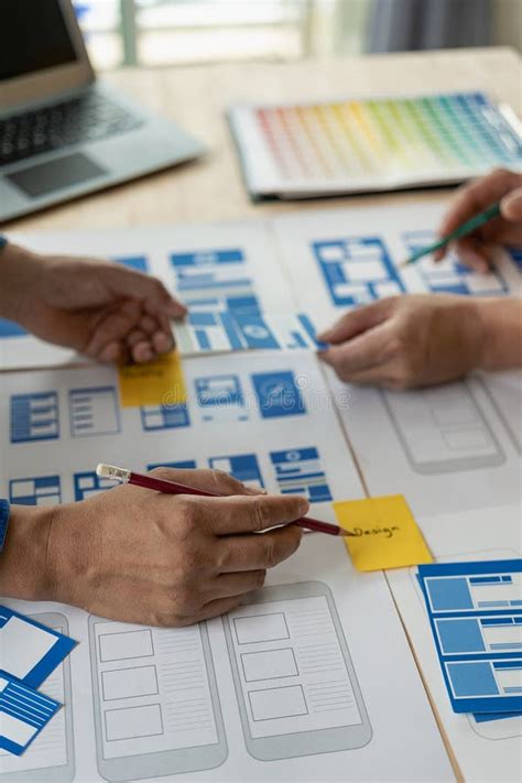 The Web Ux Ui Design Team Is Writing Code And Layers To Customize The Smartphone Front Ux Ui