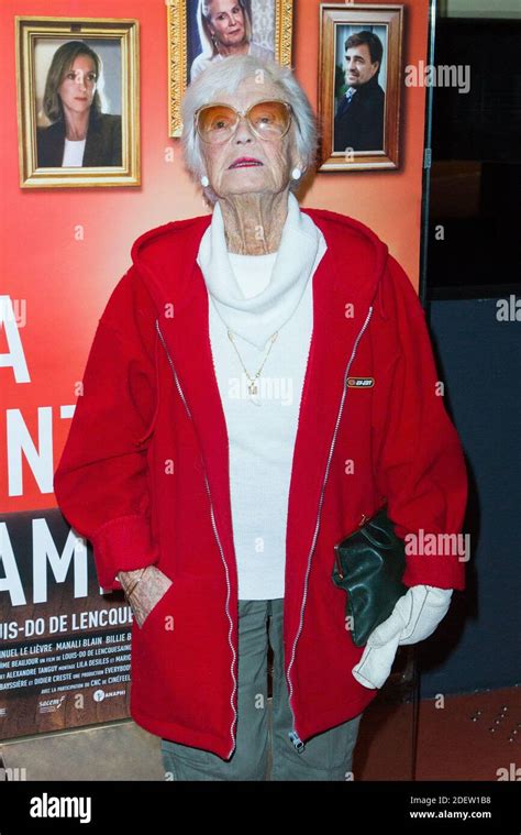 Brigitte Auber Arrive à La Première Du Film La Sainte Famille à Lugc