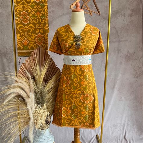 Jual Kain Tenun Endek Khas Bali Motif Patra Kuning Gold Gringsing