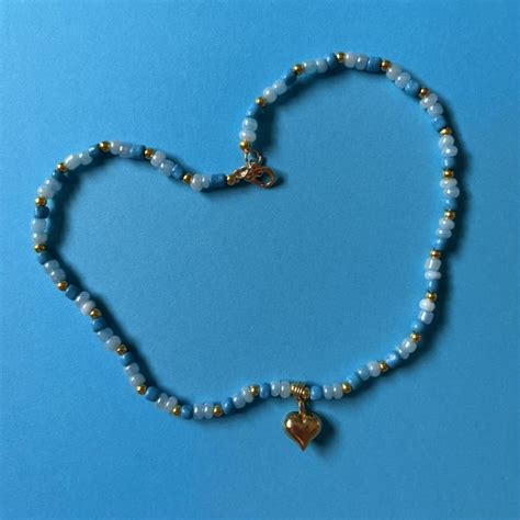 Blue And Gold Beaded Necklace With Heart Depop