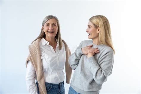 Two Good Looking Women Spending Time Together And Looking Enjoyed Stock