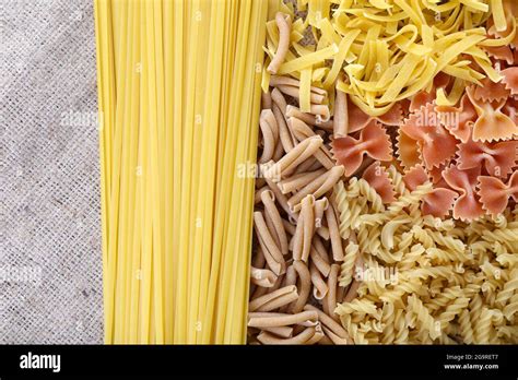 Different Types Of Pasta On Sackcloth Background Stock Photo Alamy