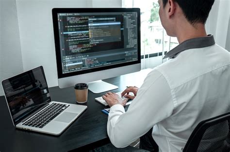 Premium Photo Young Programmer Working In Software Javascript
