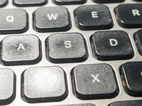 Close Up Of A Laptop Keyboard Showcasing The Texture And Worn Keys