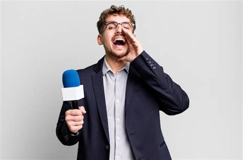 Premium Photo Feeling Happygiving A Big Shout Out With Hands Next To Mouth