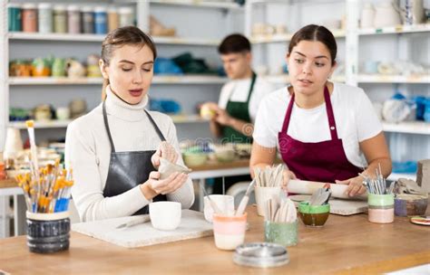 Two Young Women Making Pottery In Workshop Stock Image Image Of Table Product 283460487