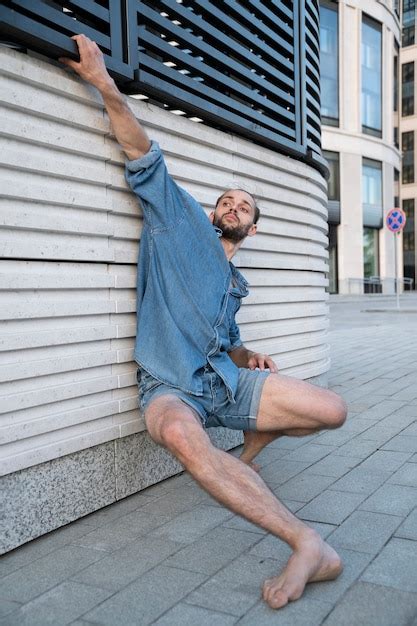 Full Shot Man Dancing Outdoors Free Photo