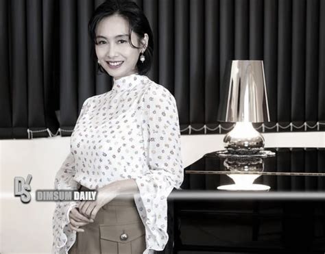 Retired Actress Athena Chus Loose Fitting Attire Accentuates Unusual Chest Shape At Fashion Event