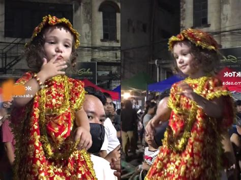 Batang nagbihis Sto. Niño, kinaaliwan ng mga deboto! Nag-flying kiss pa sa mga bumabati dito ...