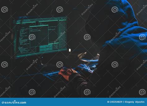 Cyber Criminal Hacking System At Monitors Hacker Hands At Work