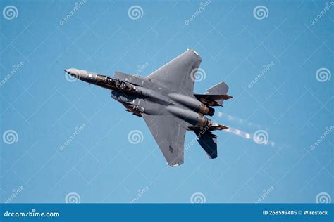 Usaf F 15e Strike Eagle Fighter Jet Flying With Afterburners In Blue Sky Editorial Image Image