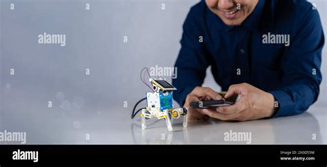 Robot Technology And Stem Education Class Concept Robots With Bright Robot Technology And Stem Education Class Concept Robots With Bright