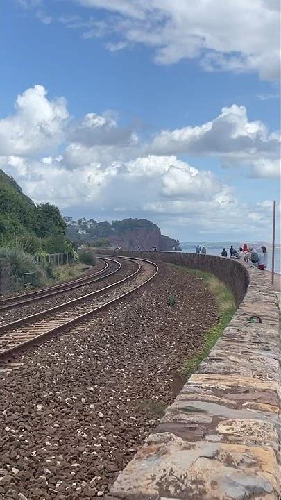 Db Cargo Uk Class 66 66023 Passing Along The Seawall At Teignmouth At Speed With Horns Youtube Db Cargo Uk Class 66 66023 Passing Along The Seawall At Teignmouth At Speed With Horns Youtube
