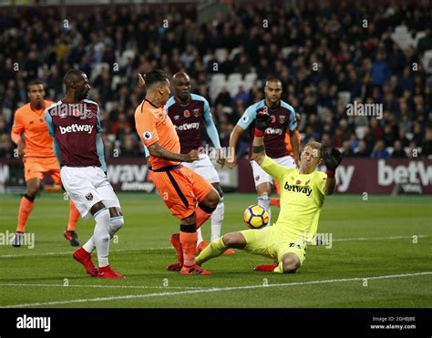 West Hams Joe Hart Saves From Liverpools Firmino During The Premier