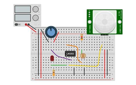 circuit design copy of lm393 pir sensor y ldr tinkercad
