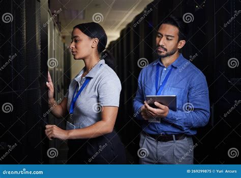 engineer server room teamwork and woman opening panel for maintenance or repairs at night