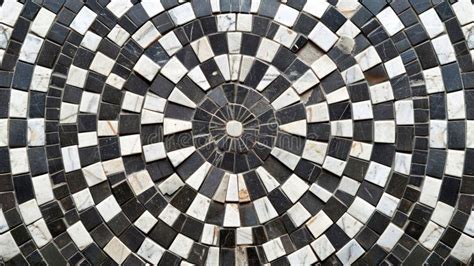 The Sharp Clean Lines Of Mosaic Tiles Forming A Symmetrical Pattern That Exudes A Sense Of