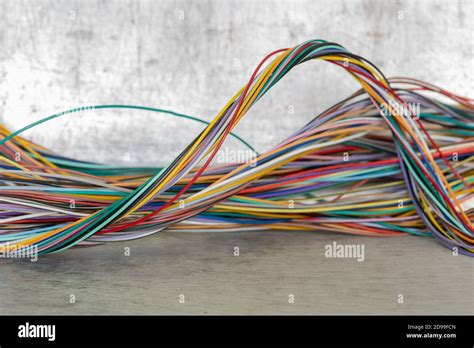 Electrical Colorful Wire And Cable Scrap On Metal Background Stock