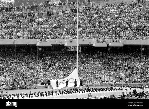 Mexico City The Hoisting Of The Official Olympic Flag At The Opening
