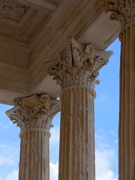 Download Ancient Maison Carrée Intricate Columns Wallpaper Wallpapers